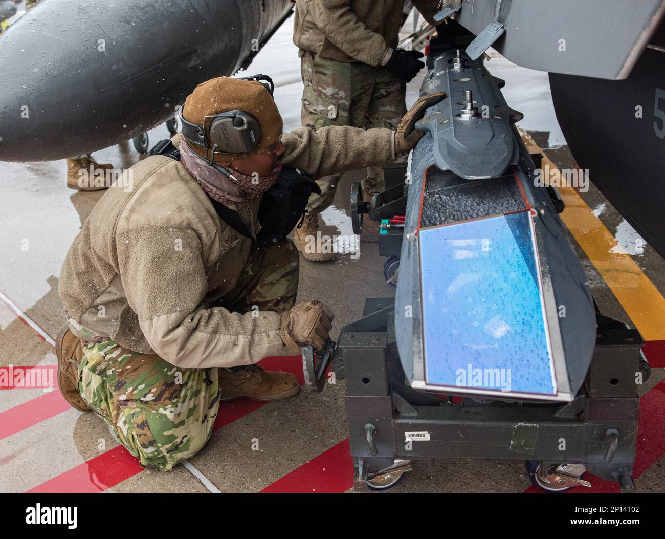 U.S. Air Force Staff Sgt. Nate Maddox and Tech. Sgt. Ryan Keel ...