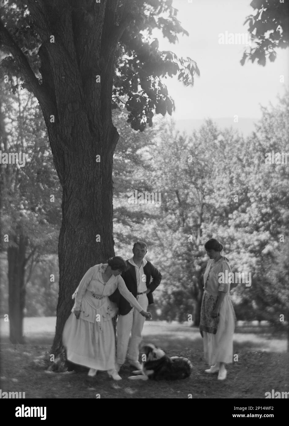 Leslie, Margeurite, and friends, standing under a tree, 1917 Aug. 18 ...