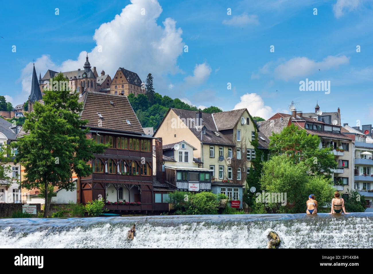 Marburg: river Lahn, bather at ground sill, houses, castle Marburger ...