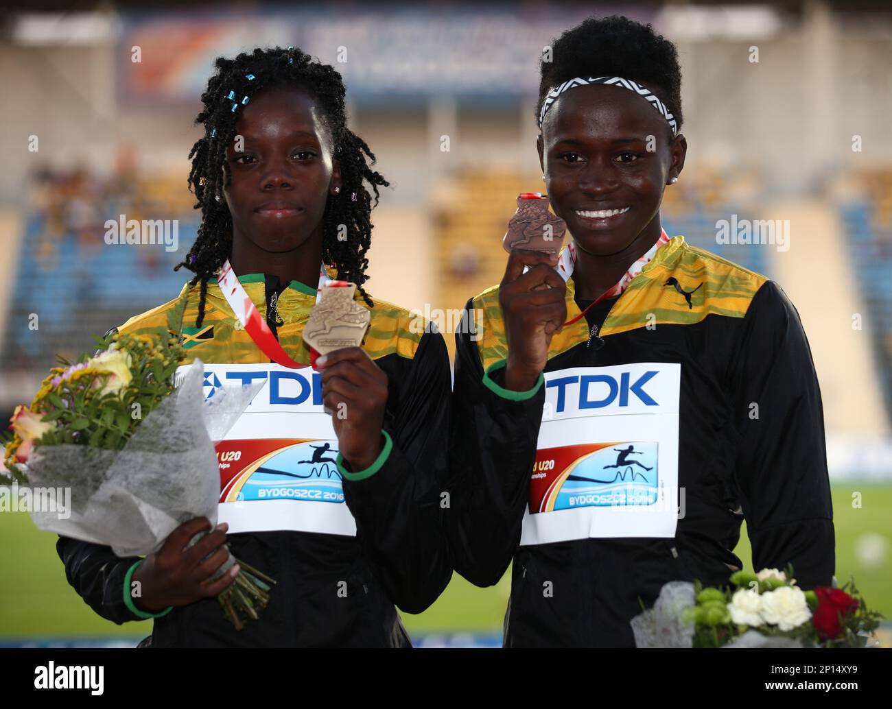 Tiffany James (left) and Junelle Bromfield (JAM) pose with gold and ...