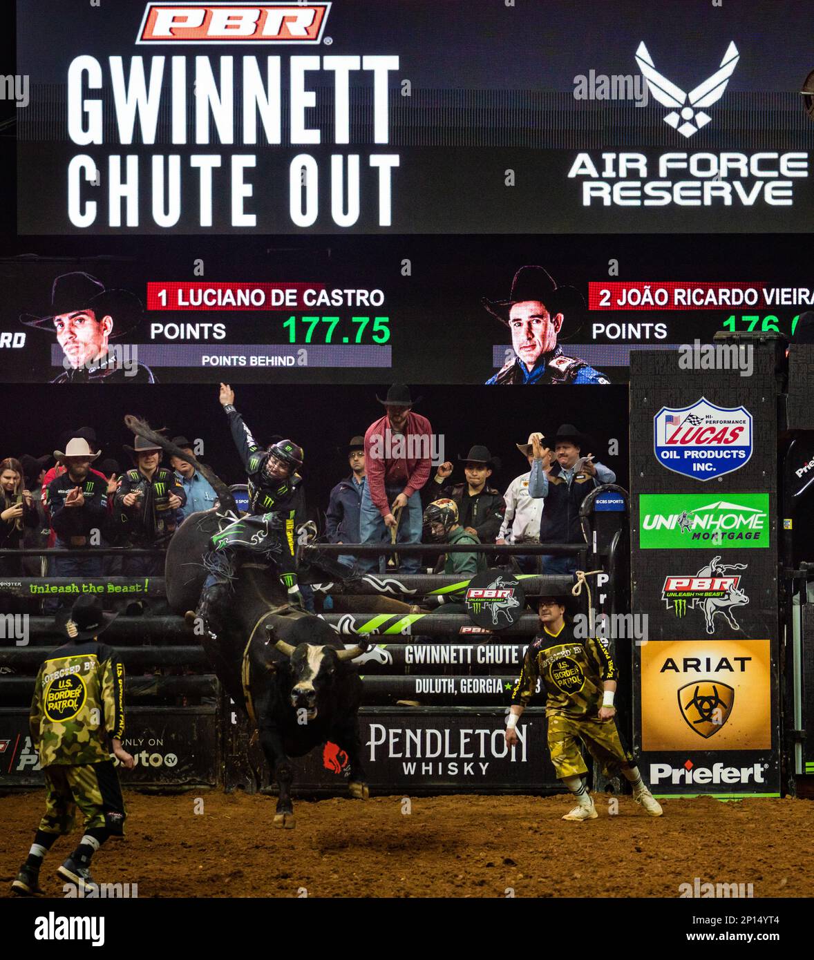 A professional bull rider competes at the PBR event “Unleash The Beast ...