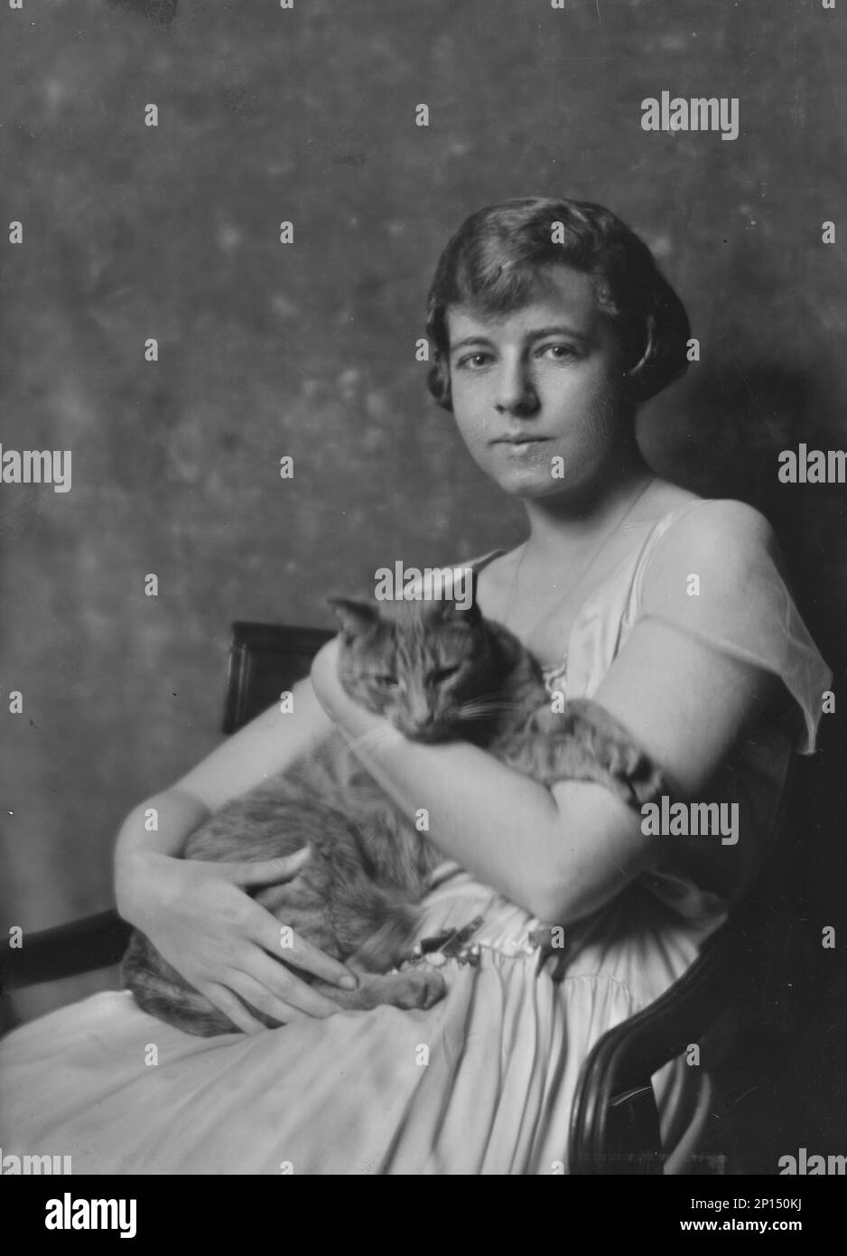 Miss Marjorie Cluett, with Buzzer the cat, portrait photograph, 1917 ...