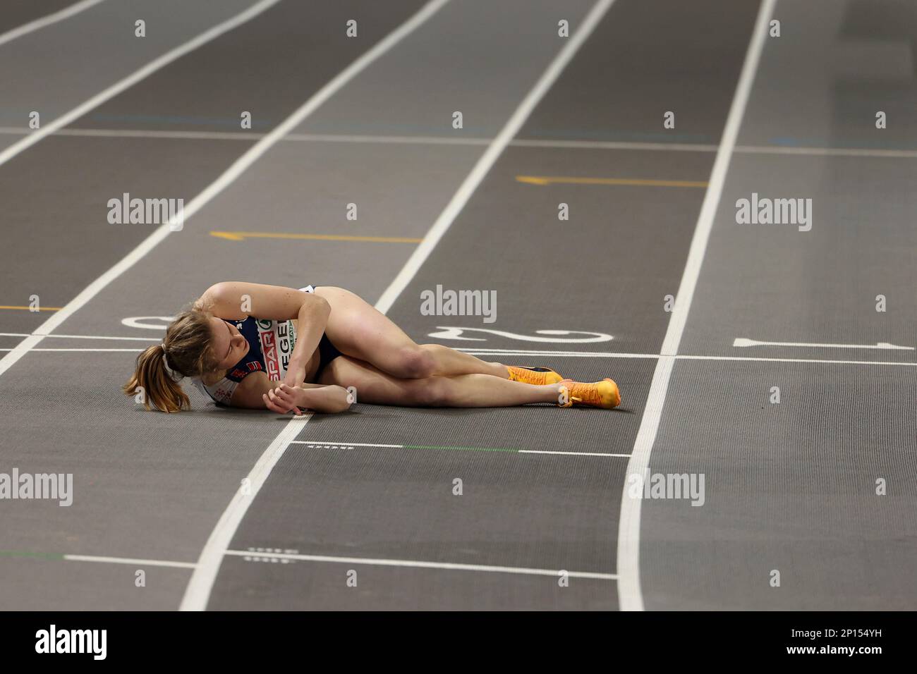 Henriette Jaeger, of Norway, lies on the track after falling at the end of a Women 400 meters ...