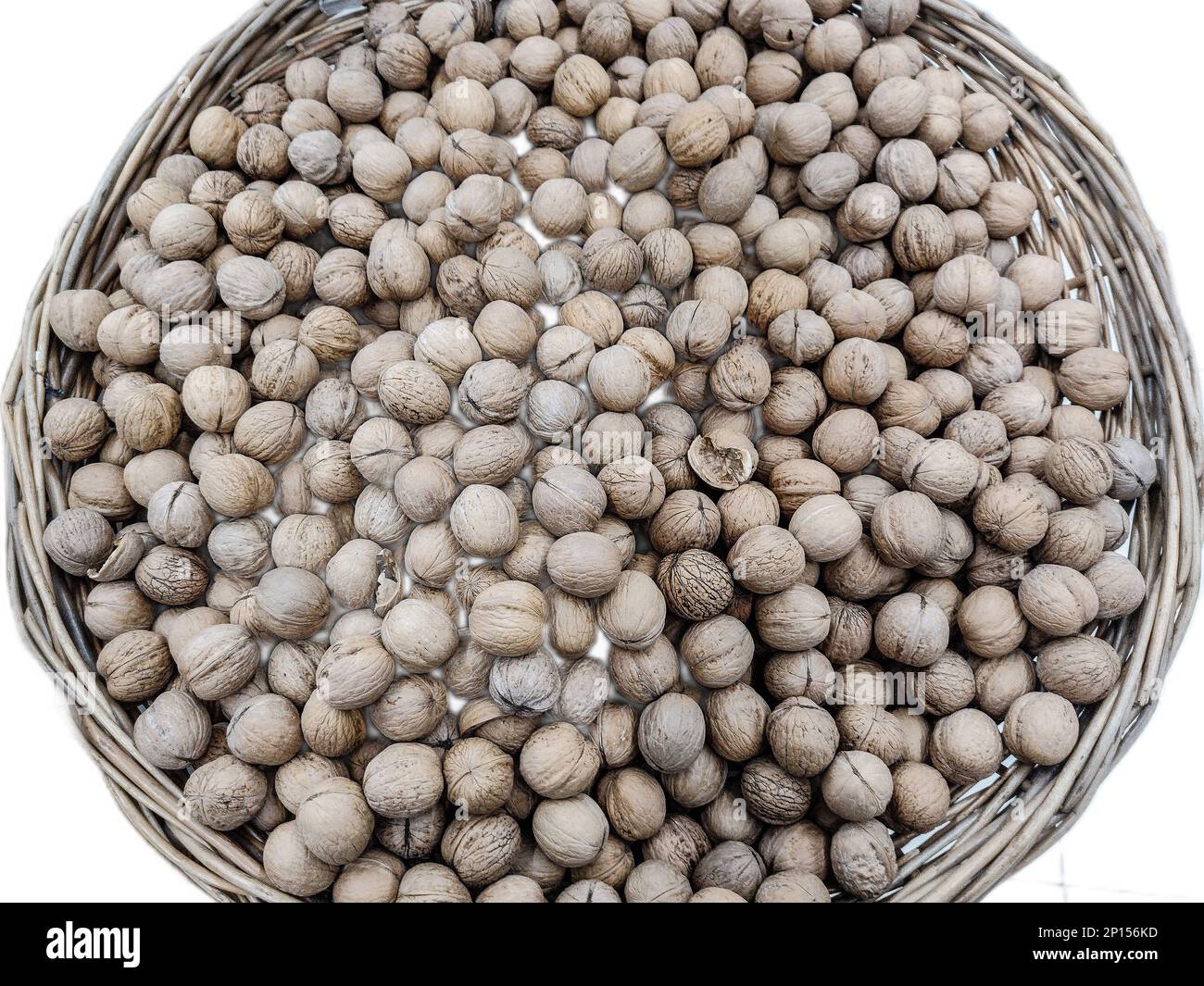 Walnuts in the shell isolated on white Stock Photo - Alamy
