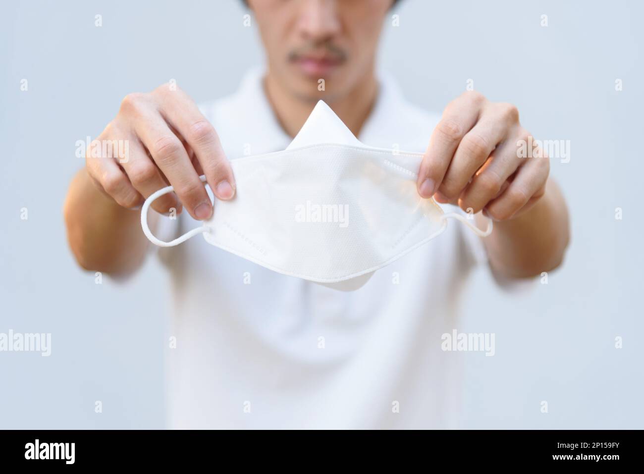 The man show mask for protect pm2.5 and protect covid 19 Stock Photo ...