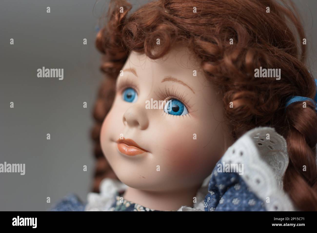 Vintage porcelain face girl doll. Close up shot, shallow depth of field ...