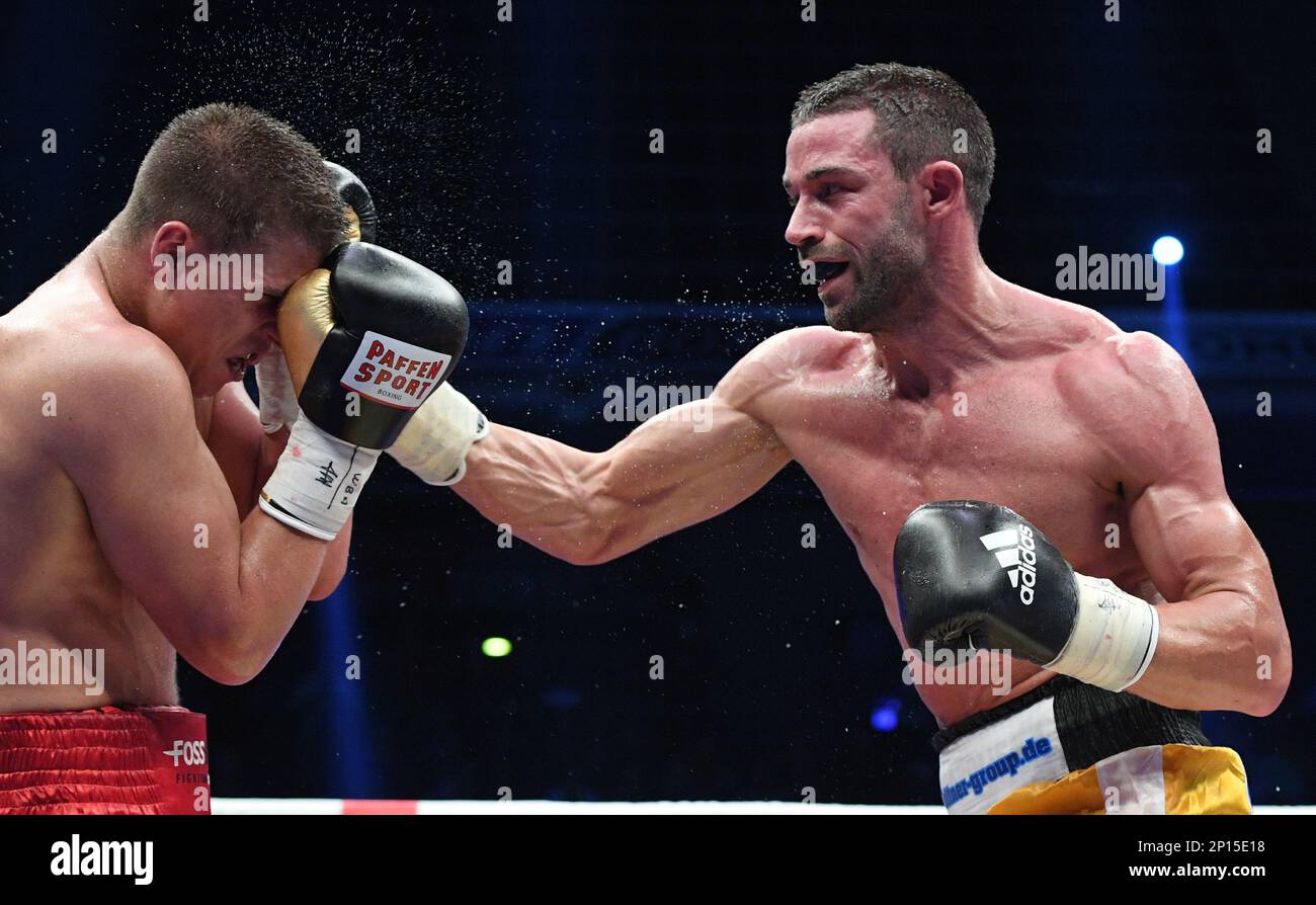 In this July 16, 2016 picture Germany's Tyron Zeuge , left, receives a ...
