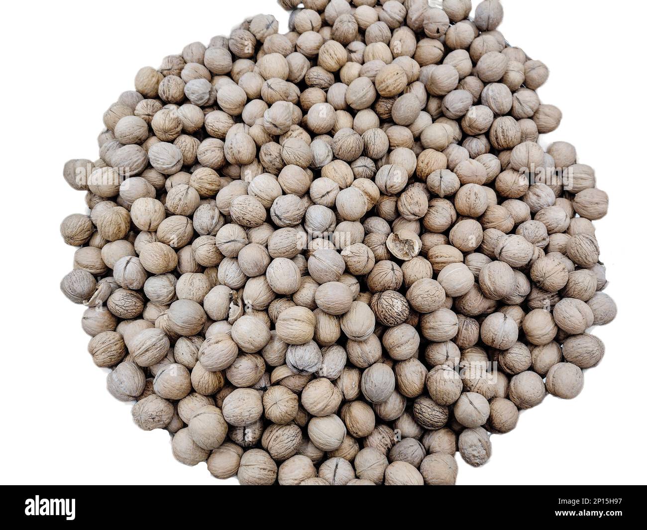 Walnuts in the shell isolated on white Stock Photo - Alamy