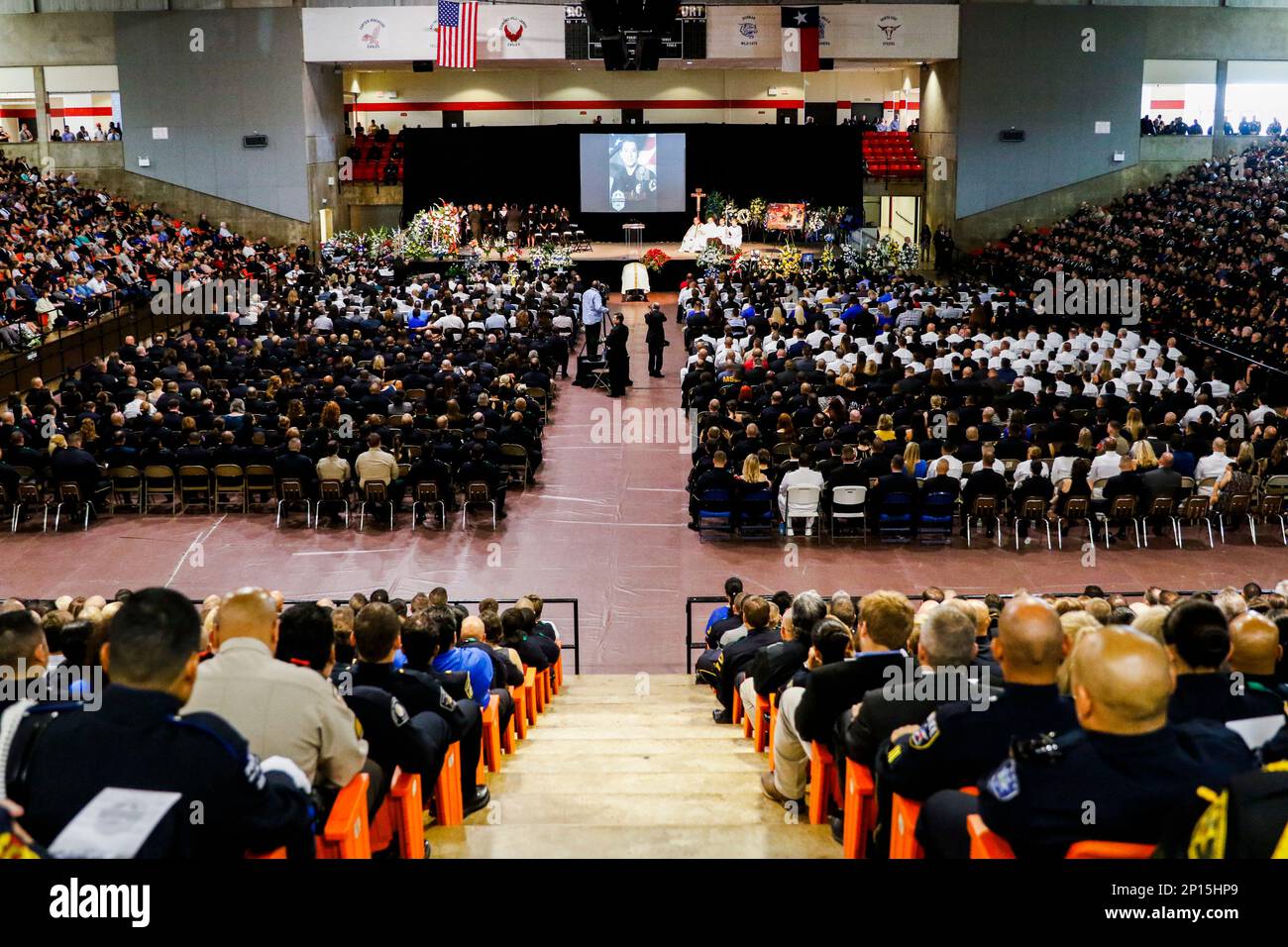 Mourners attend the funeral service for Dallas police officer Patrick ...