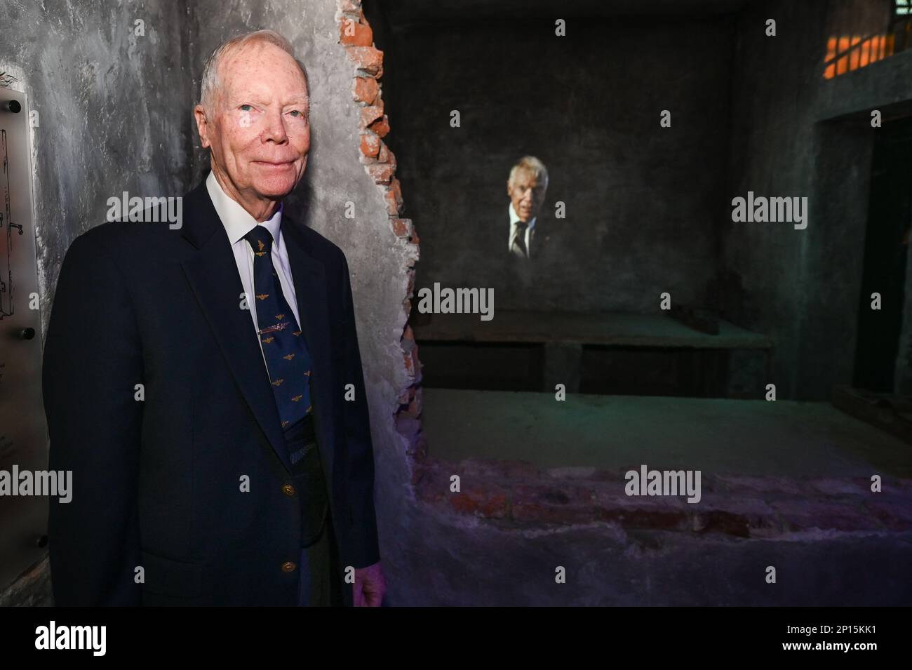 Retired U.S. Navy Rear Adm. Robert “Shu” Shumaker has his photo taken ...