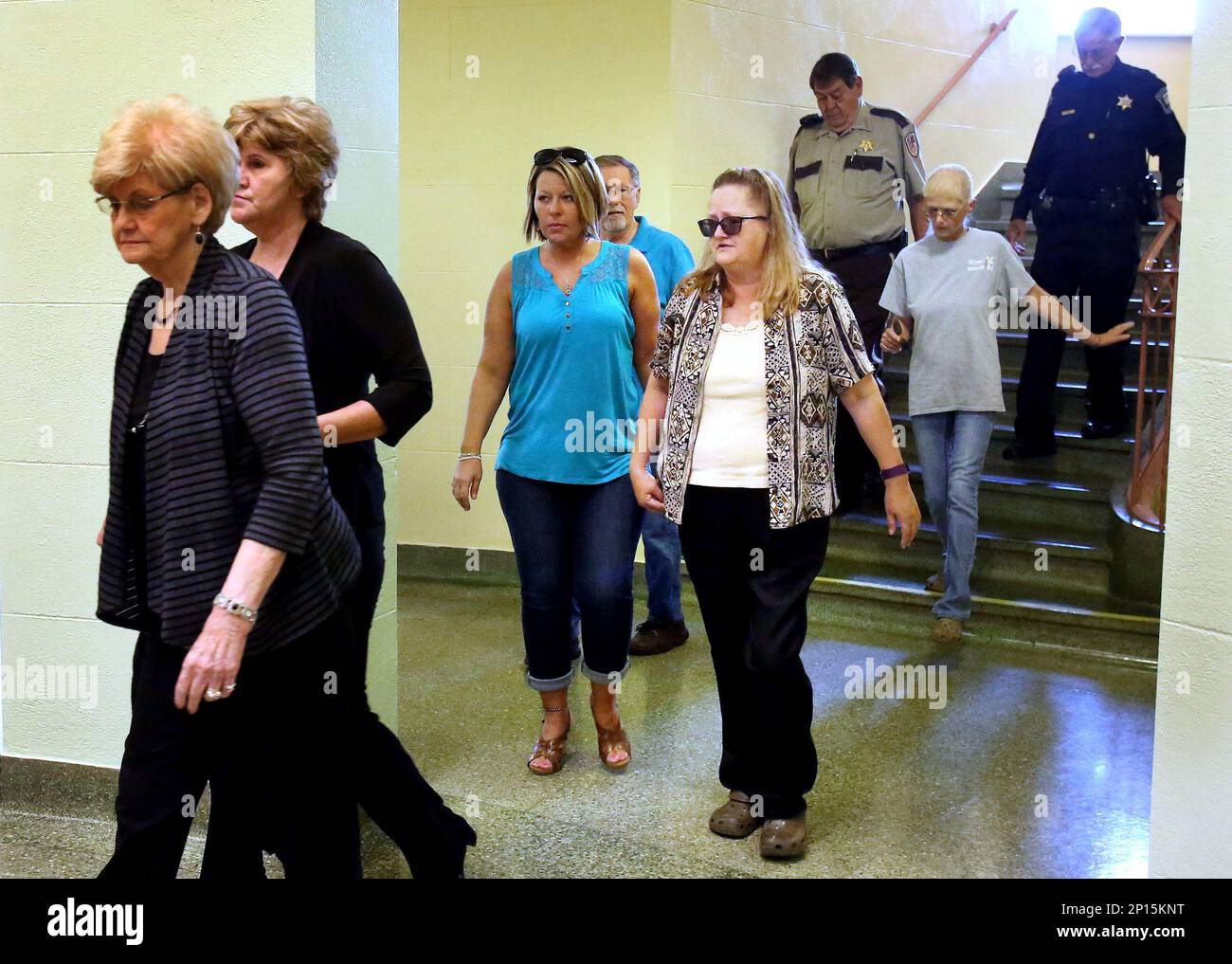 Lisa Chambers, center right, wearing sunglasses, family and supporters ...