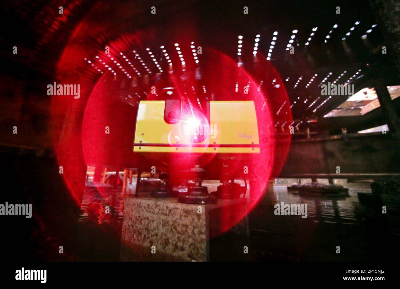 A Surphaser 3D laser scanner beams a laser underneath the USS Monitor's ...
