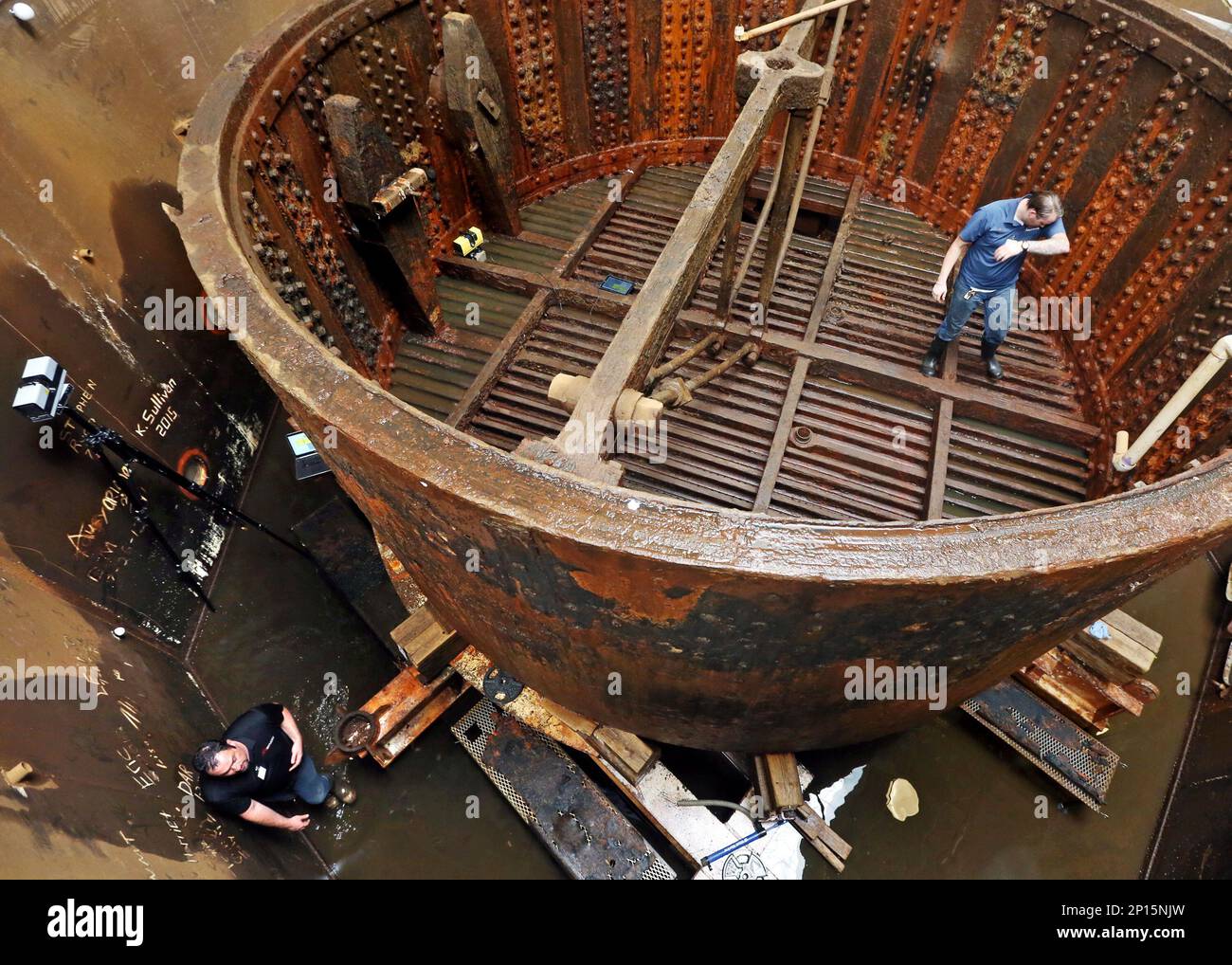 Ryan Ritter, left, and Stephen Strand, right, with API Services prepare ...