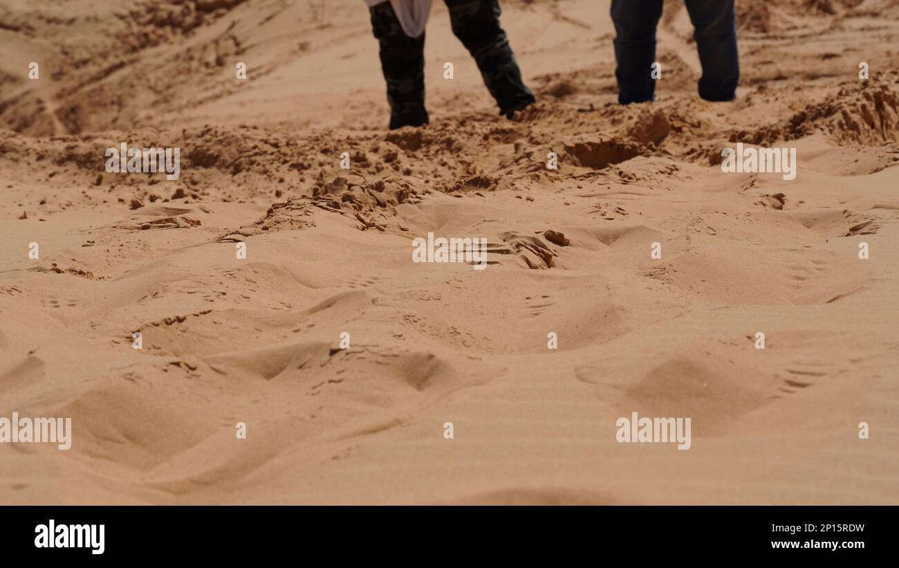 Two mens legs walking hi-res stock photography and images - Alamy