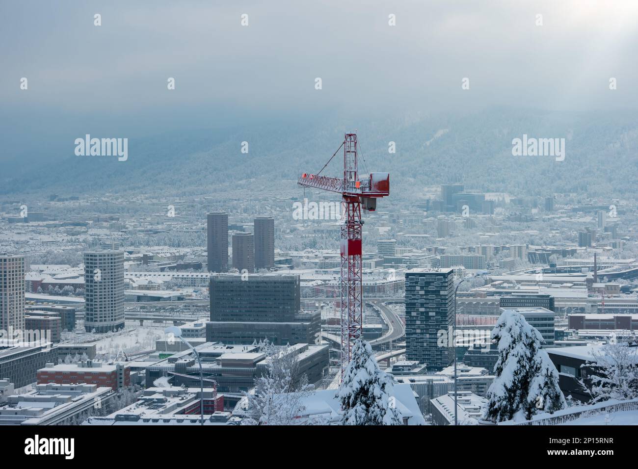 Snow covered Zurich city Switzerland high vantage point view red ...