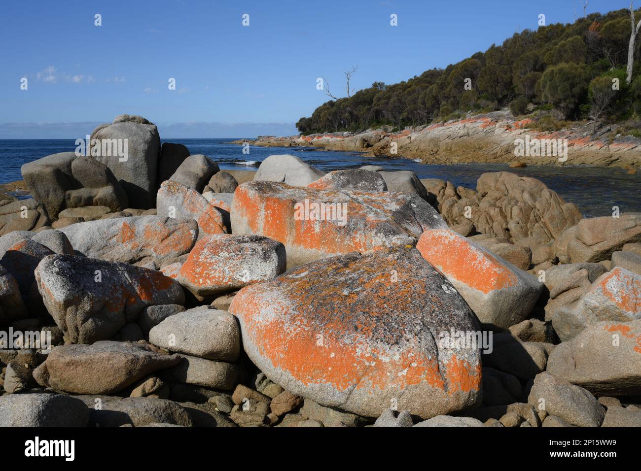 Orange boulders and pristine coastline and beaches at Skeleton Bay ...