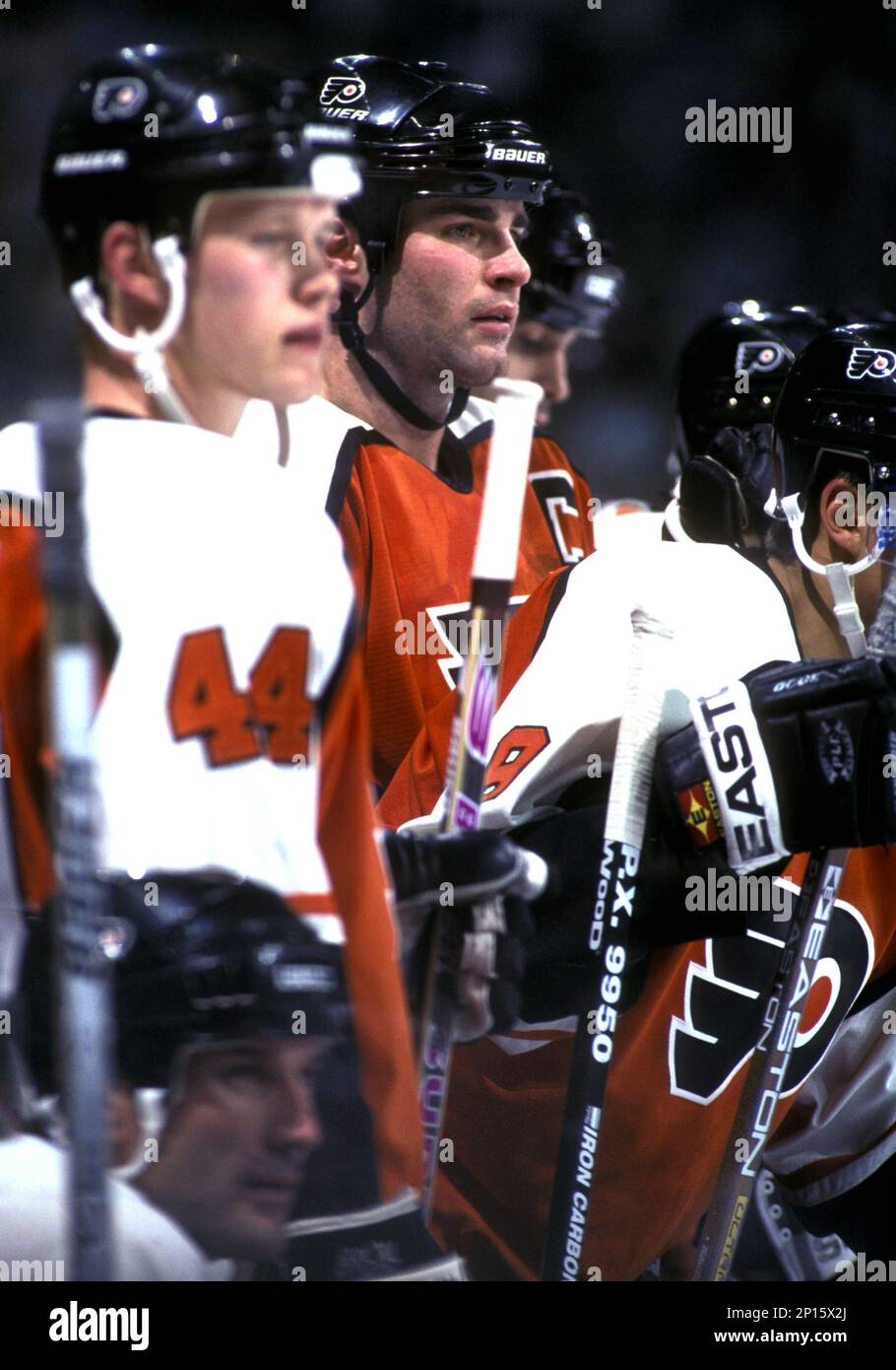 Philadelphia Flyers forward Eric Lindros (88) watches play from the ...