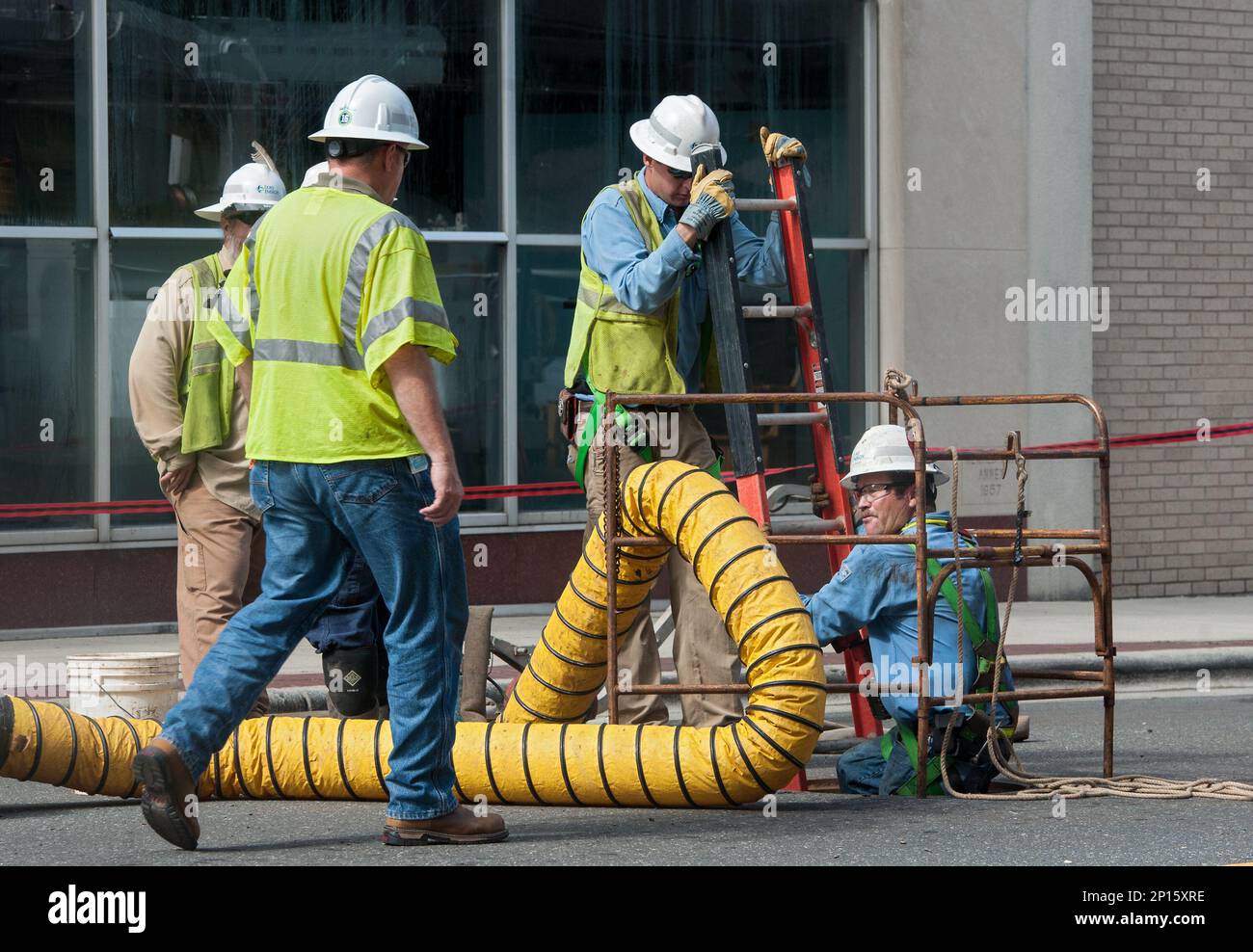 Duke Energy crews work on Chapel Hill Street on Wednesday, July 13 ...
