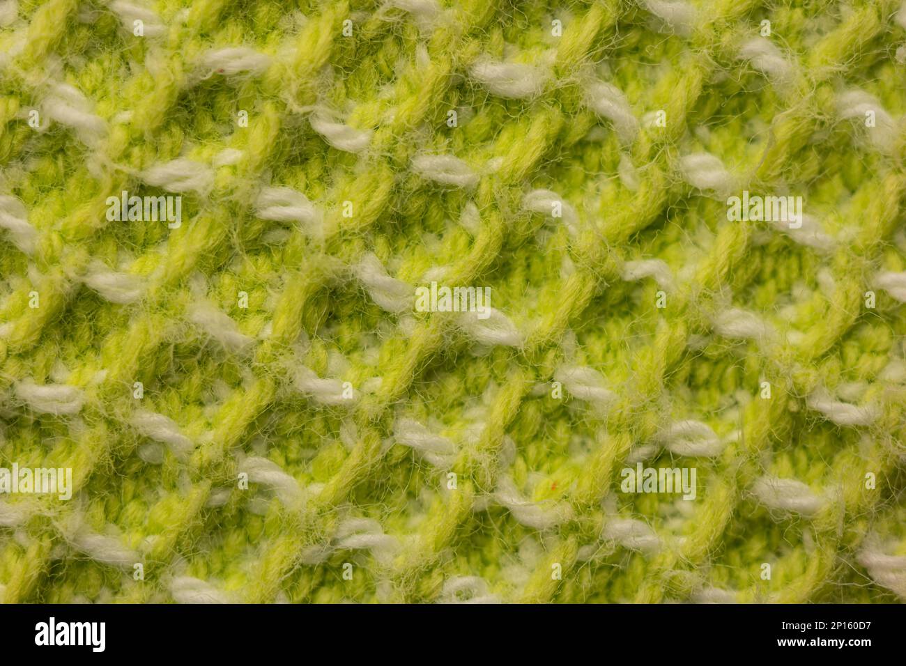 Green colored woven cloth macro close up top view square pattern weave ...