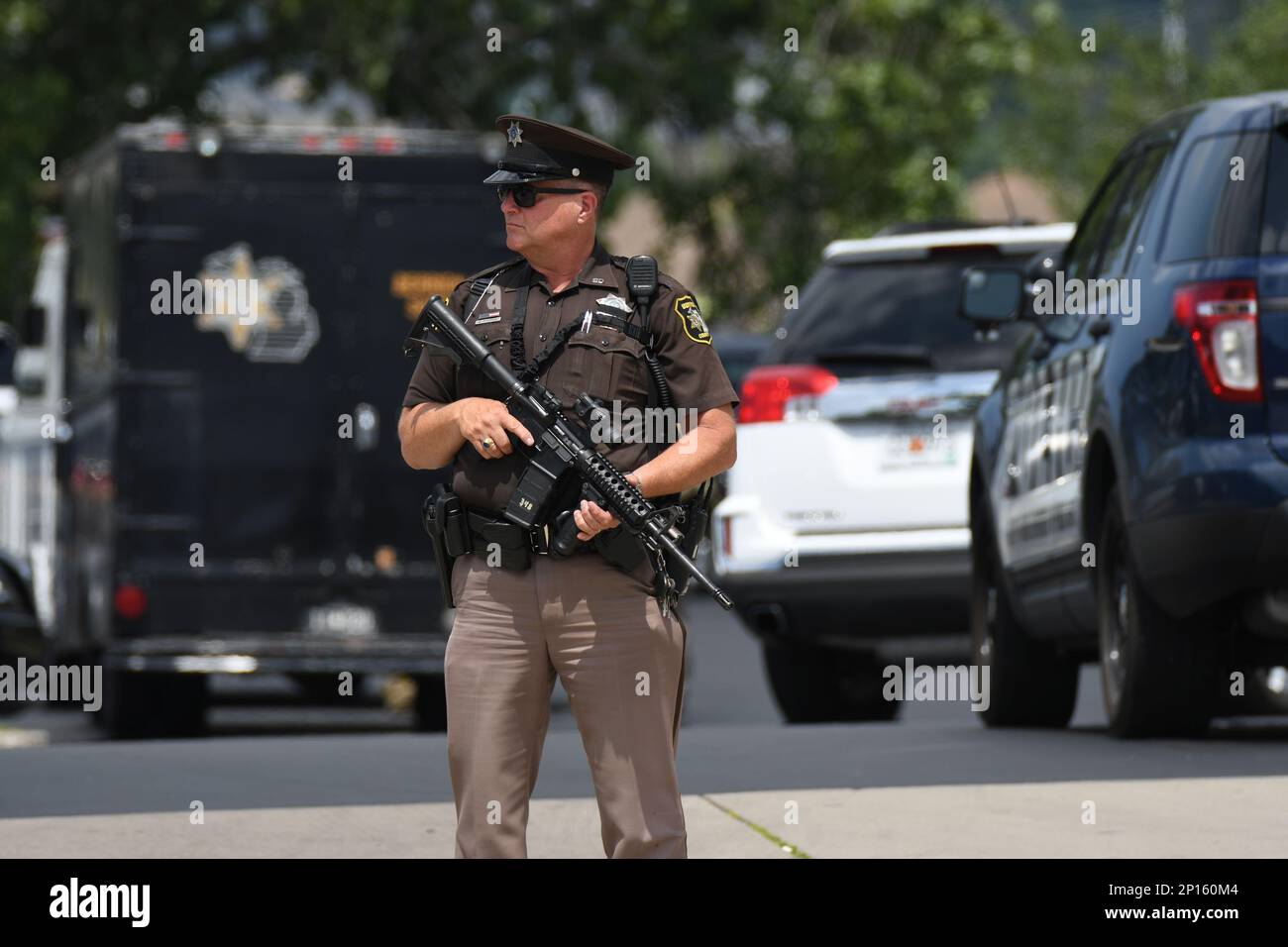 Sheriff's Deputy Guy Puffer stands watch outside the Berrien County ...