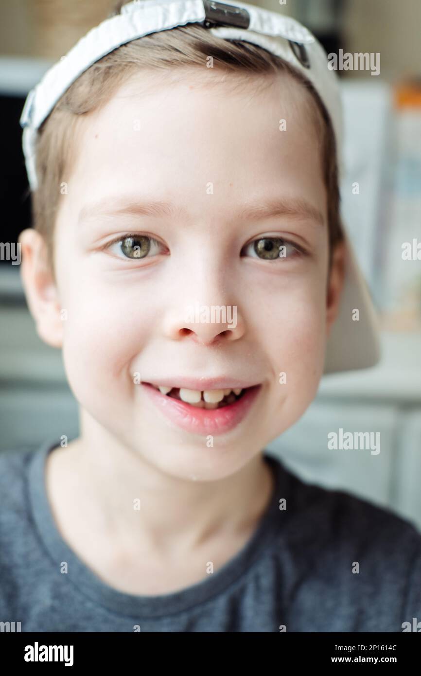 vertical portrait of a six year old smiling boy Stock Photo - Alamy