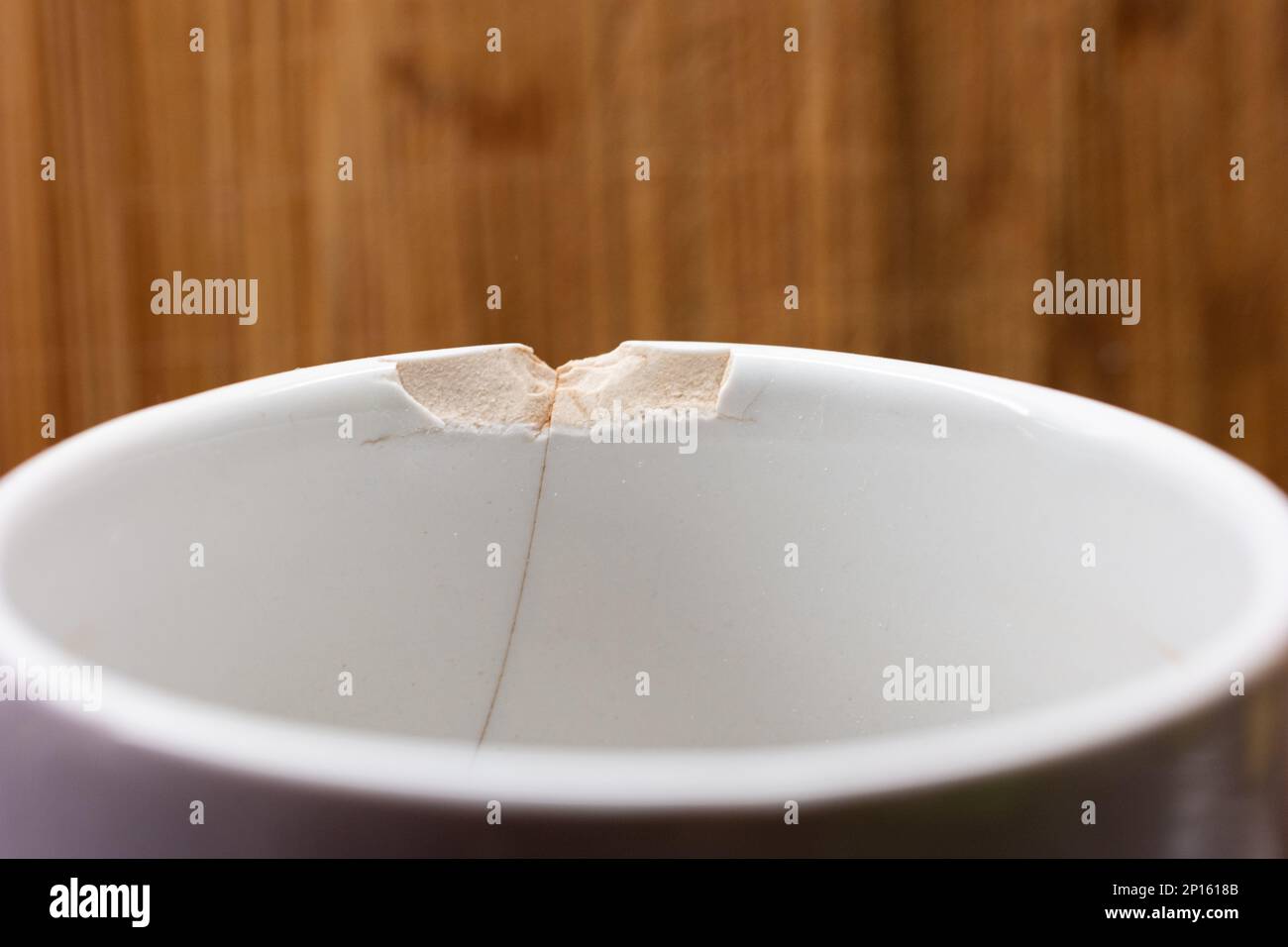Chipped ceramic cup macro close up shot in the kitchen Stock Photo - Alamy