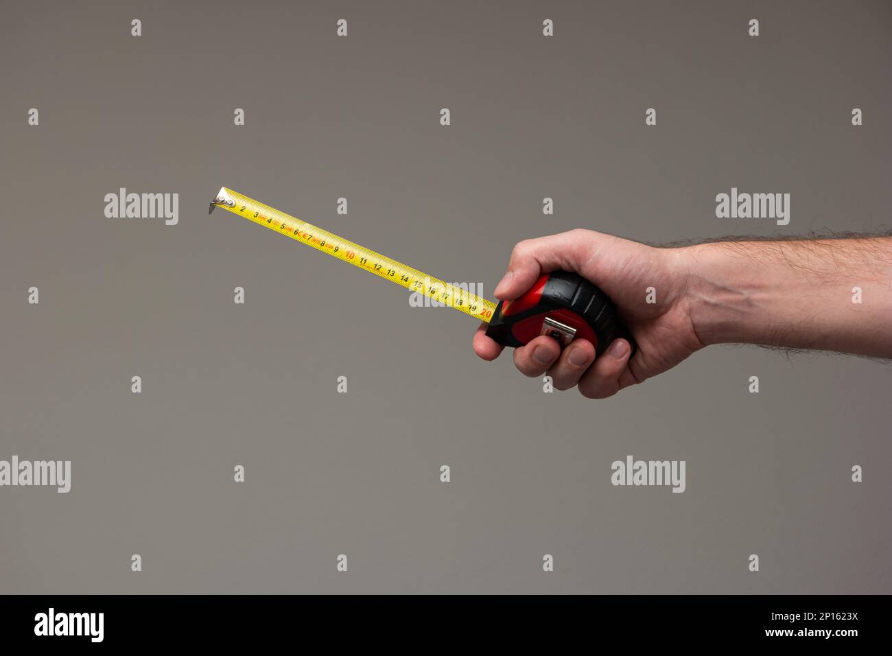 Measuring hand on ruler hi-res stock photography and images - Alamy