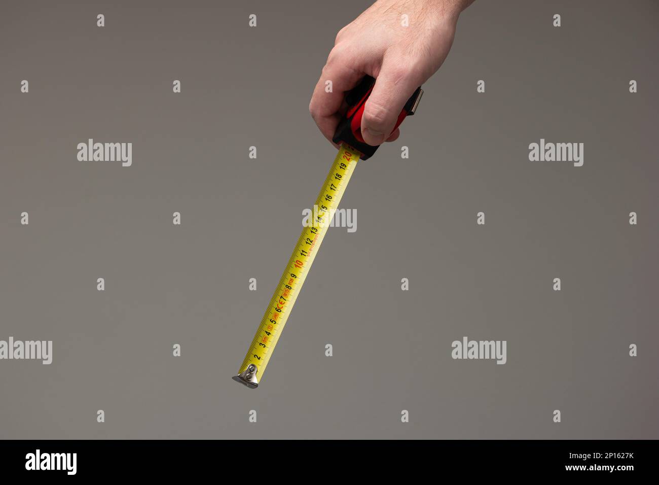Measuring hand on ruler hi-res stock photography and images - Alamy