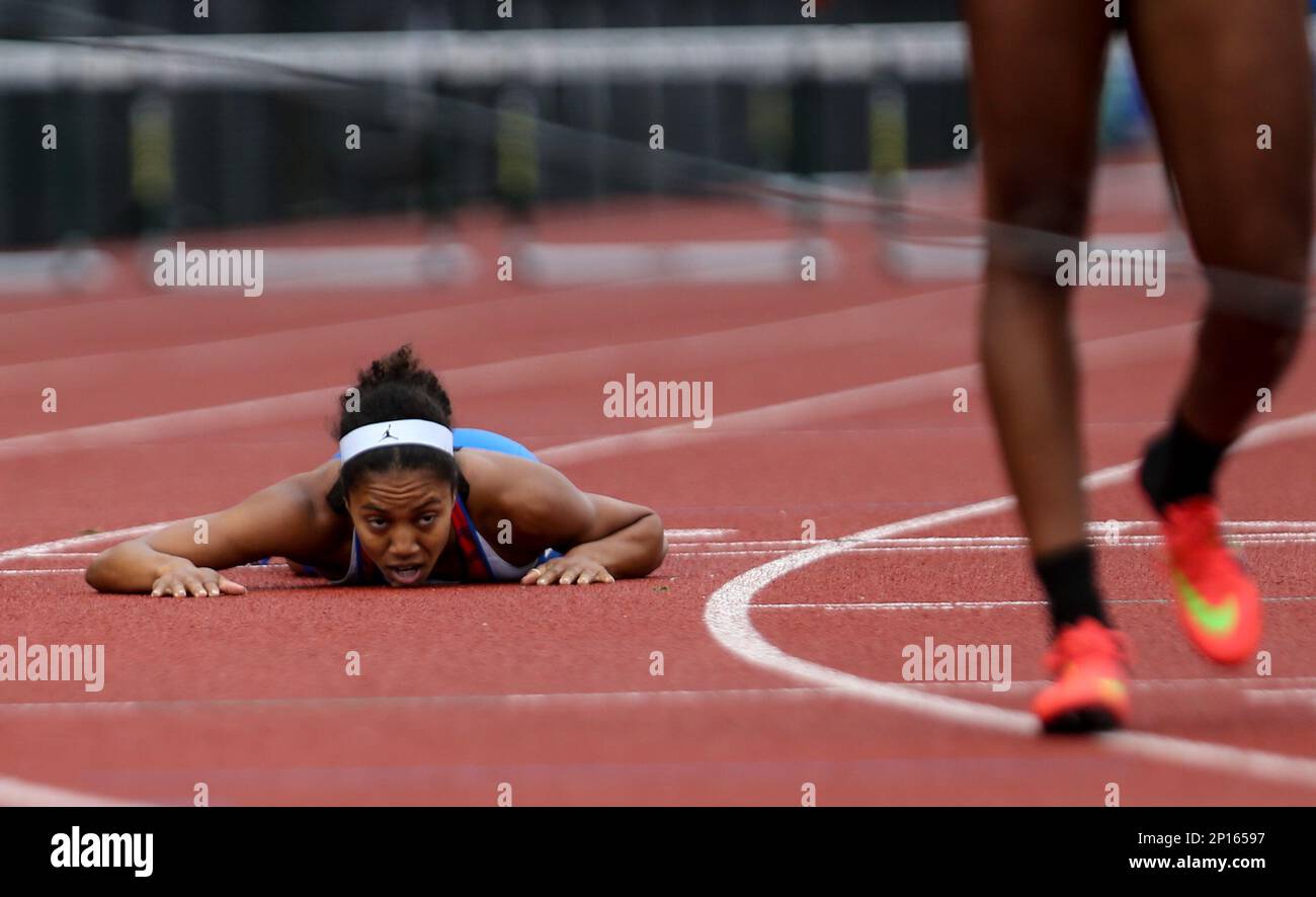 July 10, 2016 - KORI CARTER lays on the track at the finish line after ...