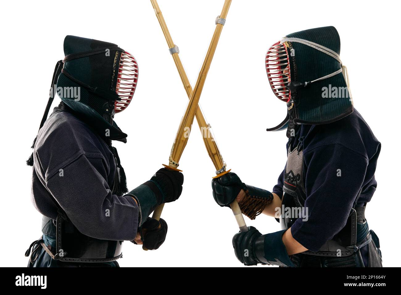 Two men, professional kendo fighter, athletes in black uniform training ...