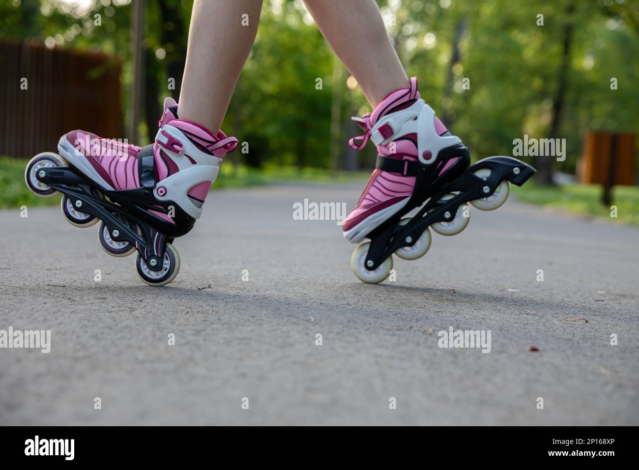 Learning to do tricks on roller skates Stock Photo - Alamy