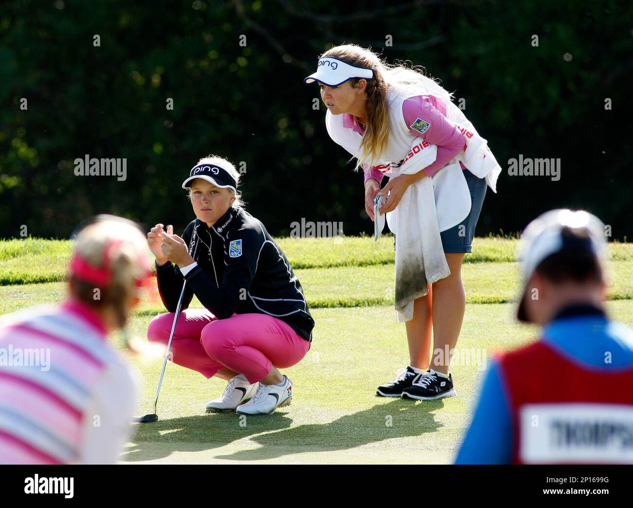 08 Jul 2016: Brook Henderson and her caddy, Brittany Henderson take a breather between holes at ...