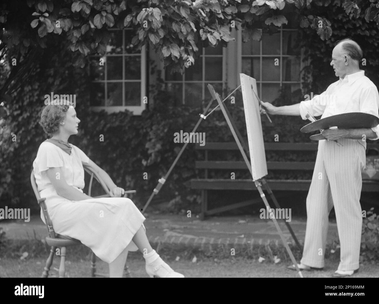 Mr. Hamilton King painting Mrs. Hamilton's portrait outdoors, between ...