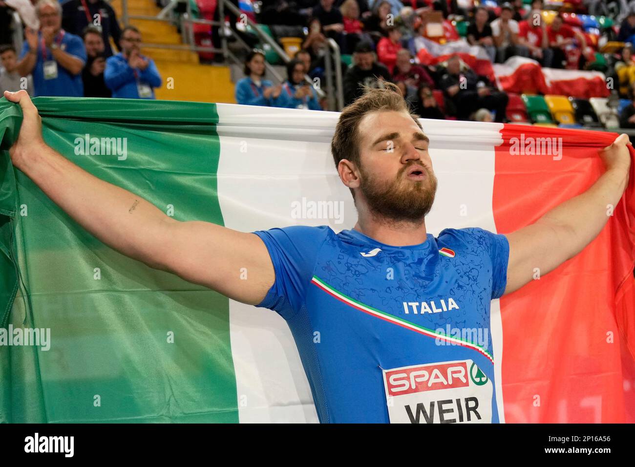 Zane Weir, of Italy, reacts after winning the gold medal in the Men ...