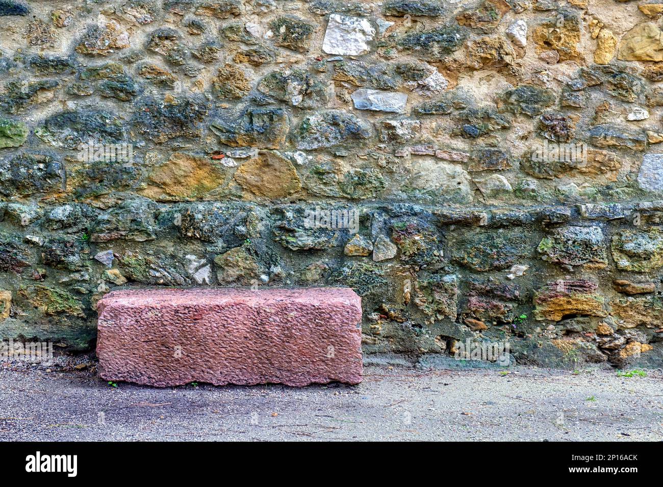 Rectangular blocks of stone serve as benches in the central plaza of ...