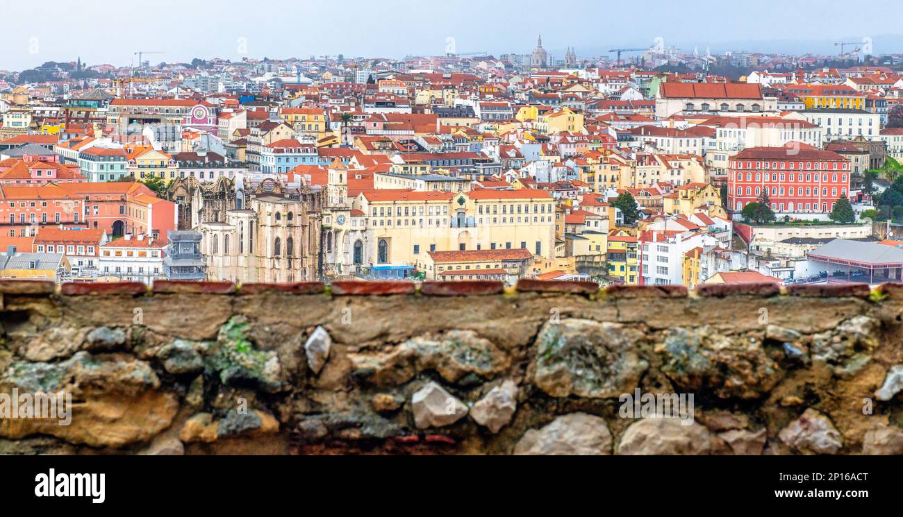 Lisbon cityscape or skyline framed in the medieval stone fortified wall ...