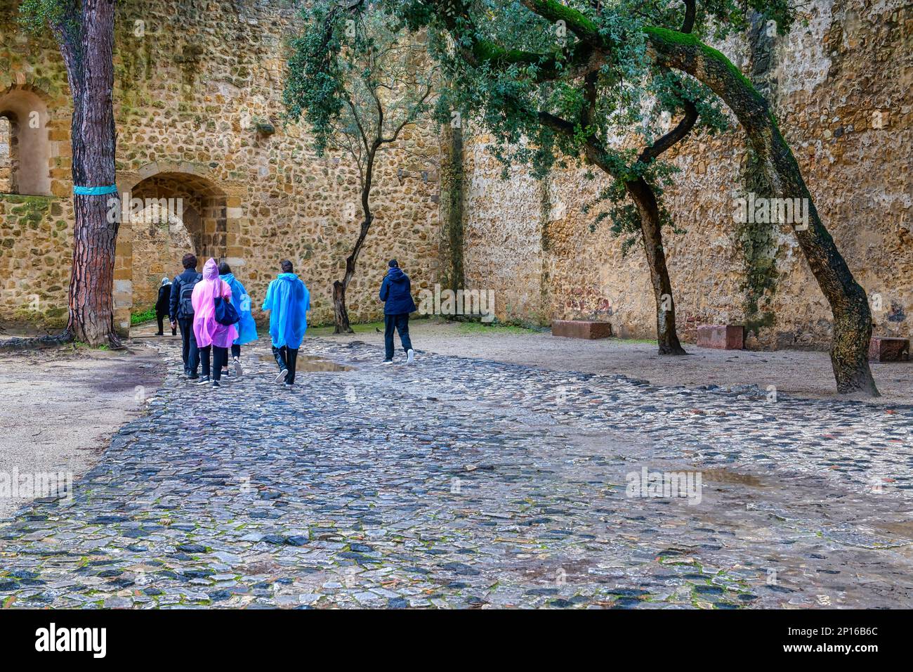 Tourists visit the medieval military fort building. The fortified walls ...