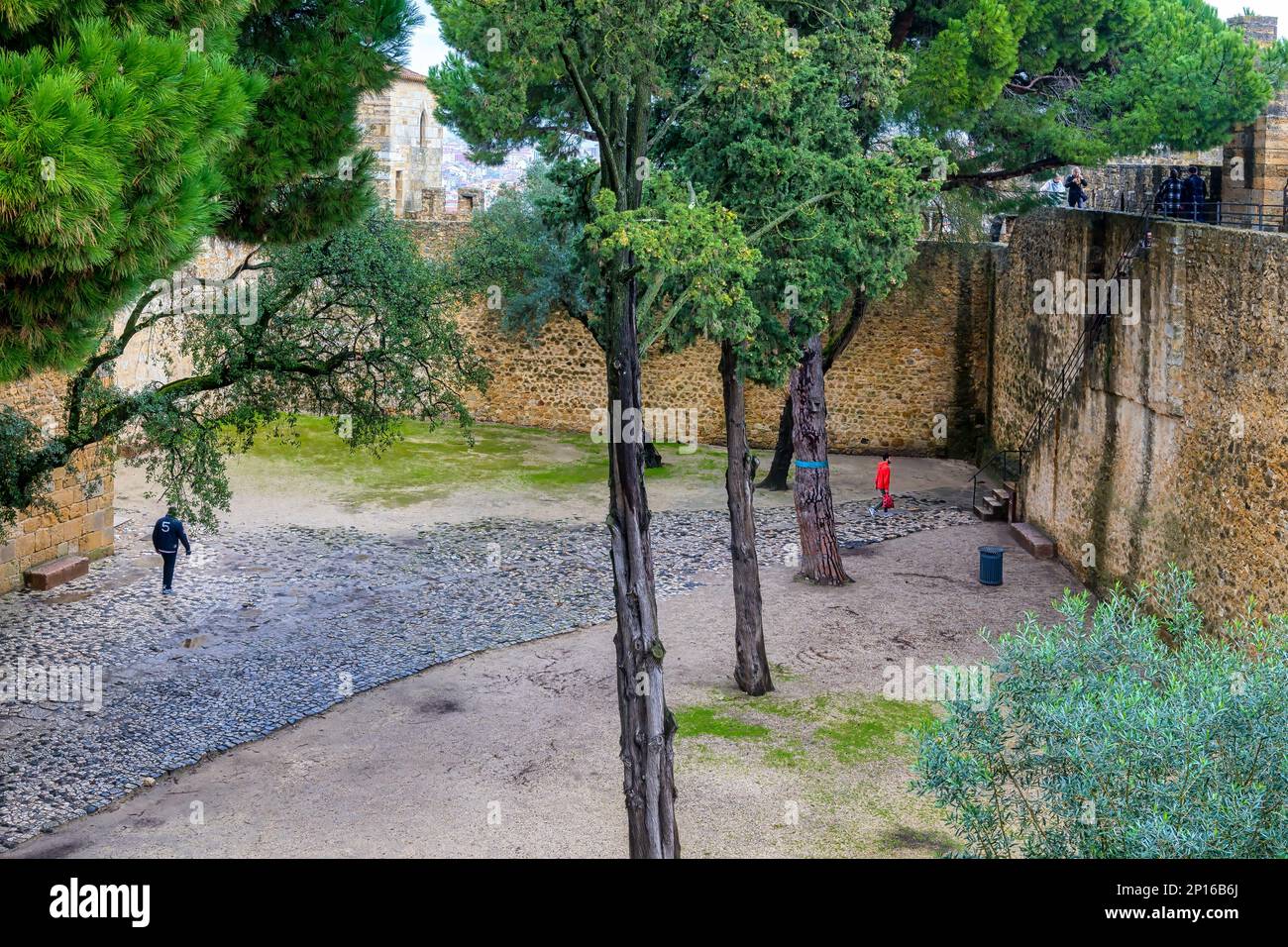 Tourists visit the medieval military fort building. The fortified walls ...