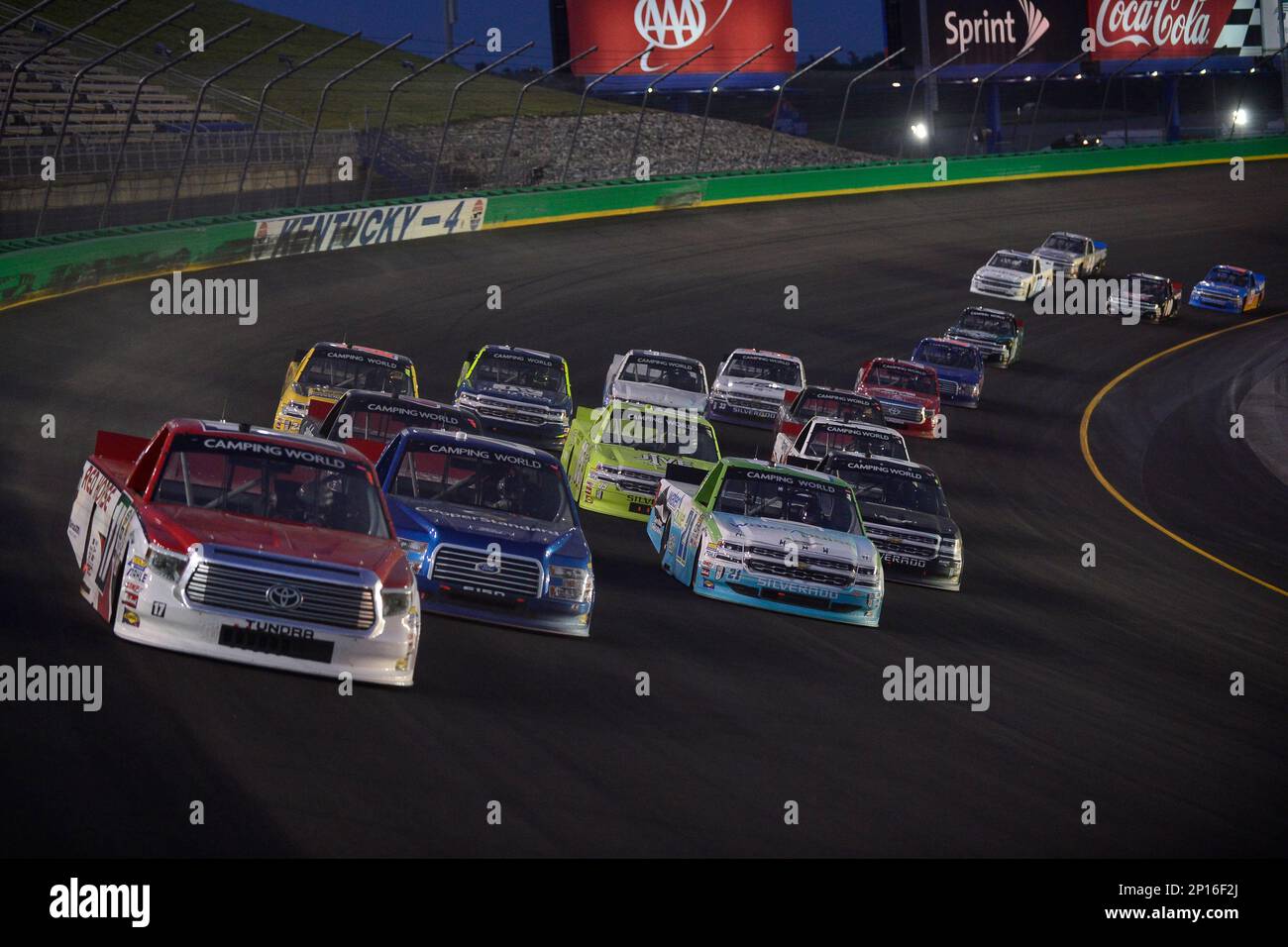 Timothy Peters (17) leads a pack of trucks through turn four during the ...