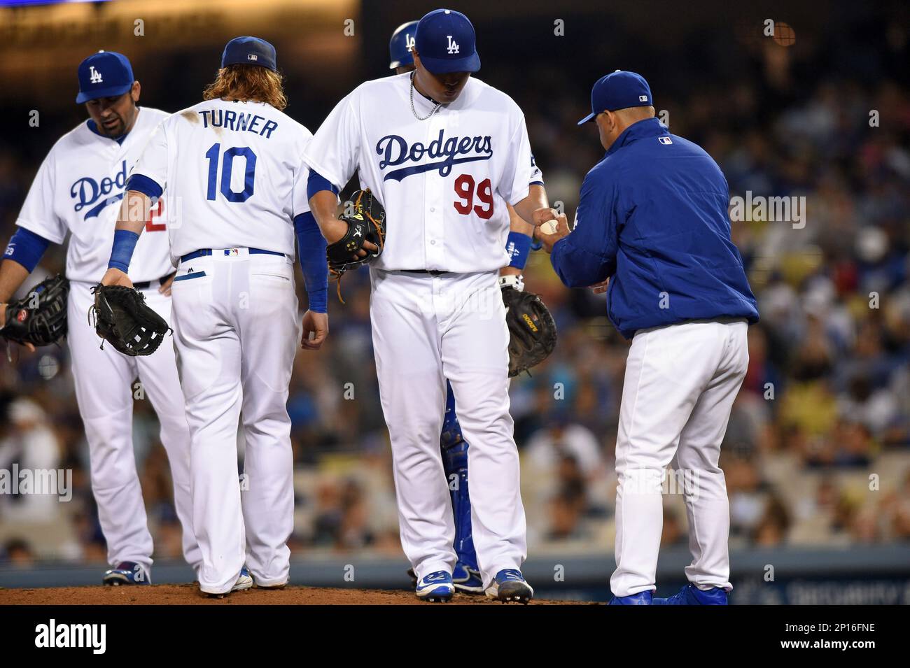 07 July 2016: Los Angeles Dodgers Manager Dave Roberts visits the mound ...