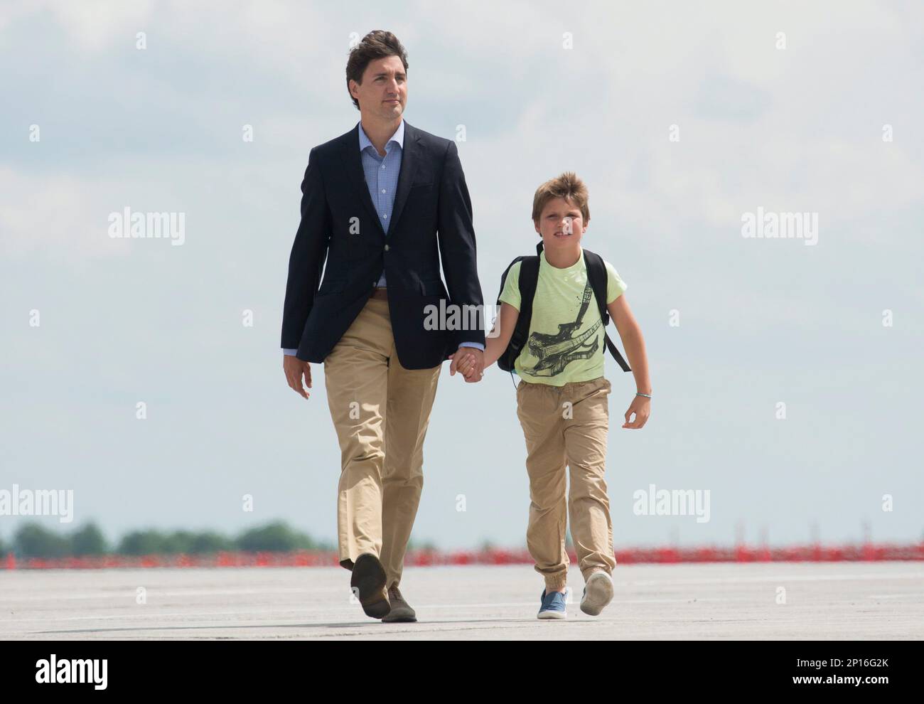 Canadian Prime Minister Justin Trudeau and his son, Xavie,r walk on the ...