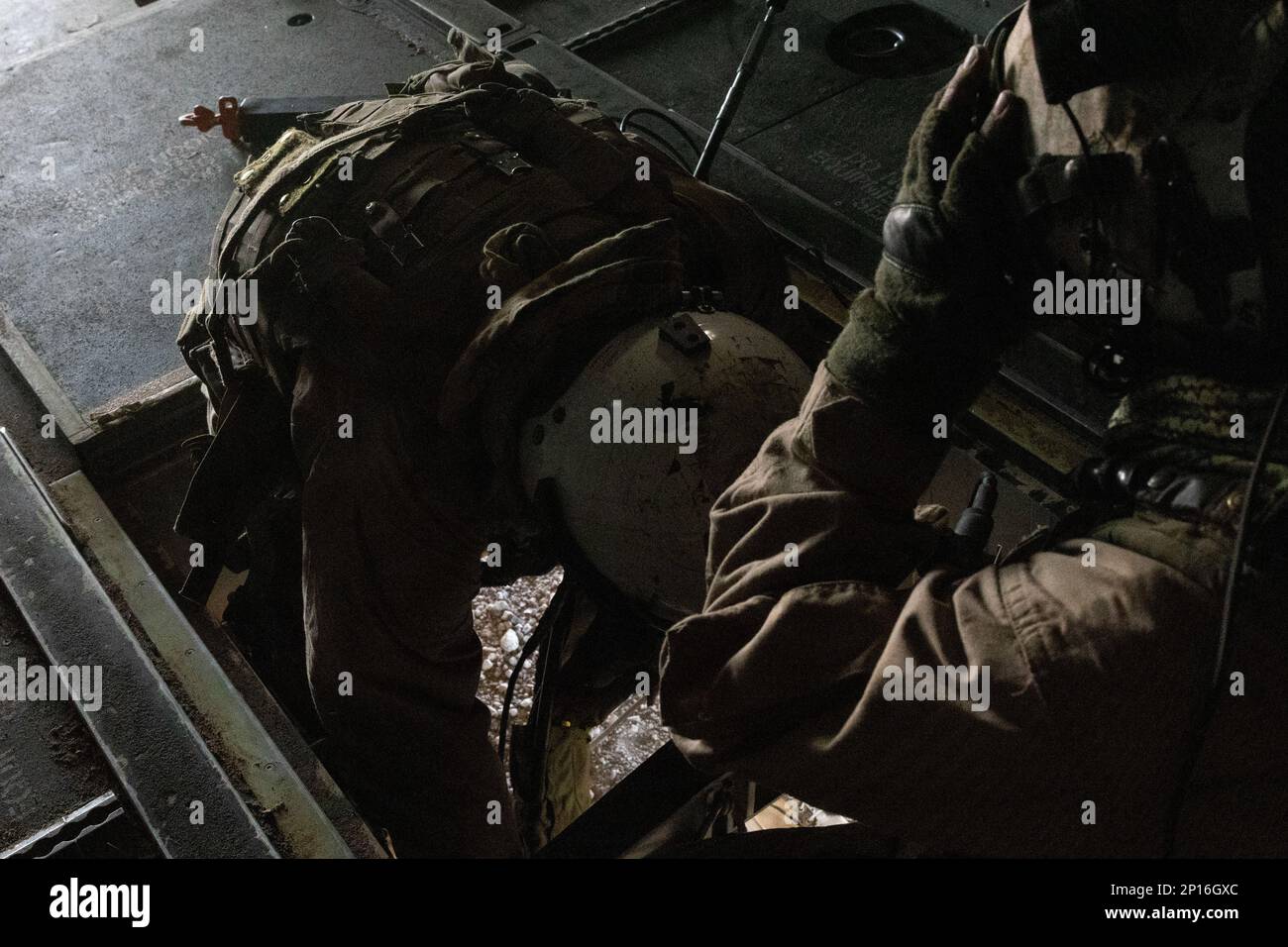 U.S. Marine Corps Cpl. Samuel B. Jones, left, a crew chief with Marine ...