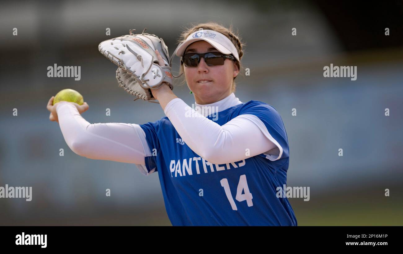 Eastern Illinois catcher Lindy Milkowski (14) throws during an NCAA softball game against ...