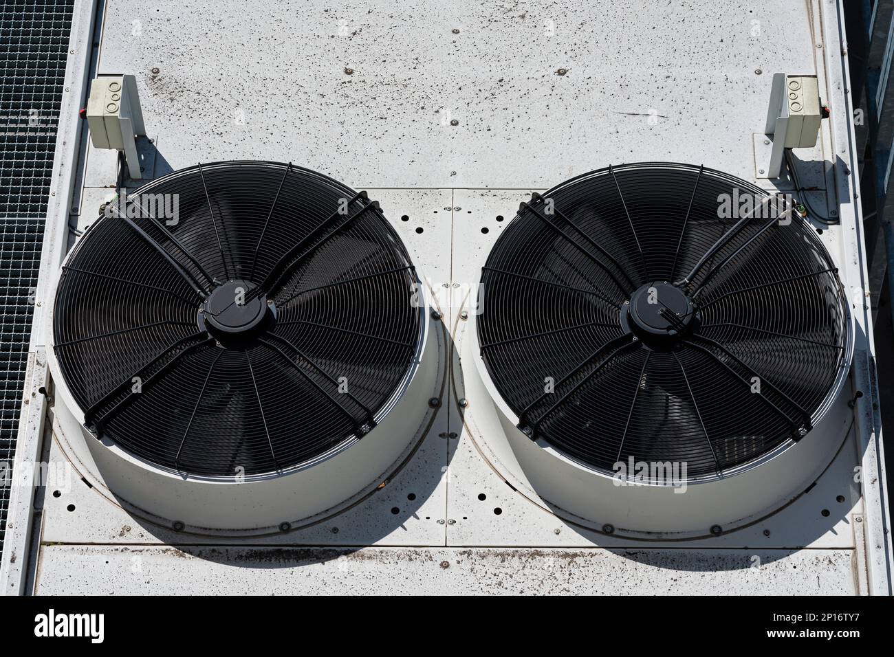 Two large industrial fans on the roof of the production building. Top ...