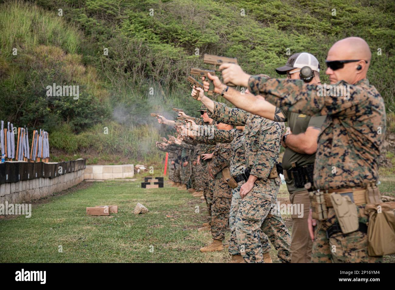 Competitors practice pistol drills during the Marine Corps Marksmanship ...