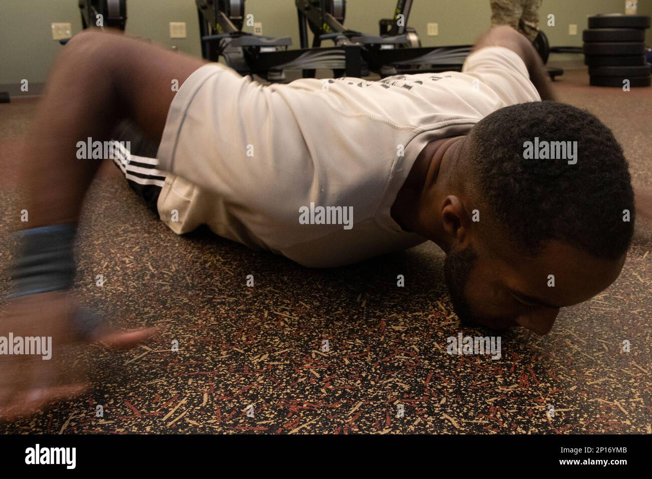 Sgt. Aldemiro Dias, Cabo Verde Special Forces, extends his arms outward ...