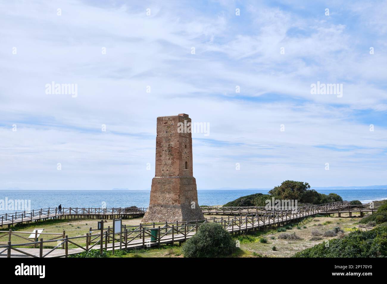 Old stone tower on Cabopino beach. Marbella coast. Province of ...