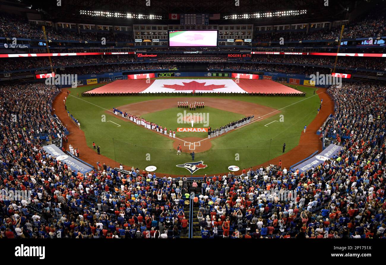 A large Canadian flag is unveiled in celebration of Canada Day during ...