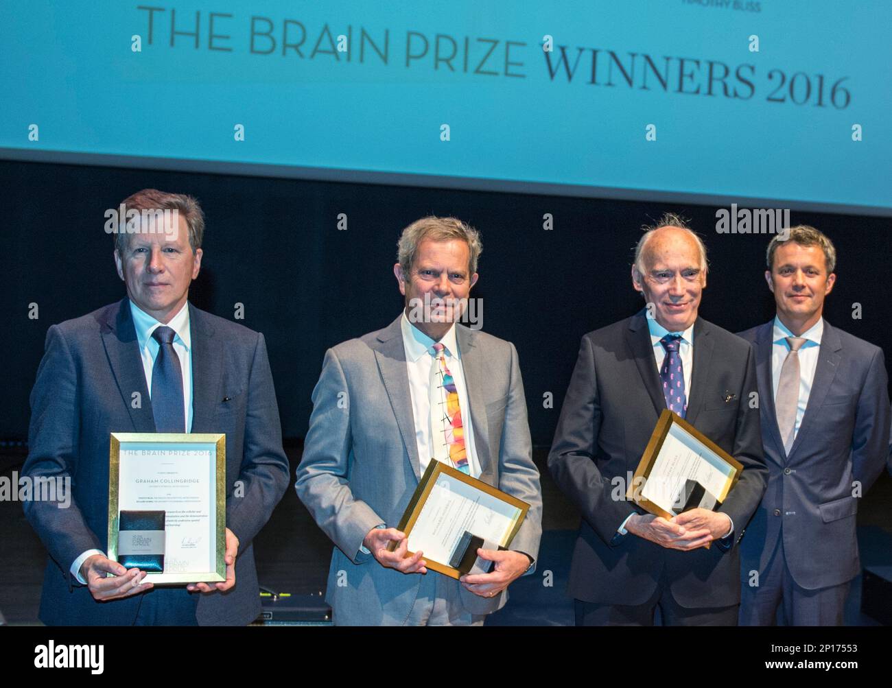 Crown Prince Frederik of Denmark, right, poses after presenting the ...