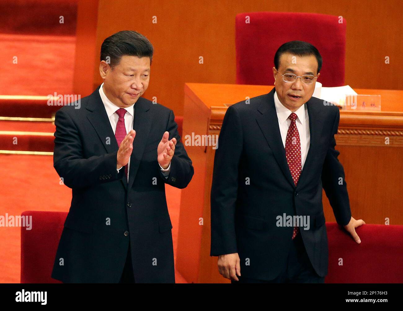 Chinese President Xi Jinping, left, and Premier Li Keqiang attend a ...